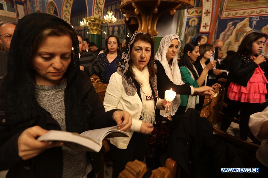 Jordanian Christians attend Mass pray for Easter in Amman - Xinhua ...