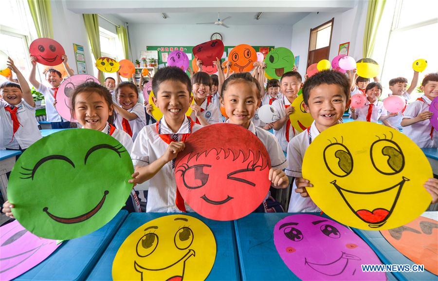 World Smile Day marked at primary school in N China's Hebei_English ...