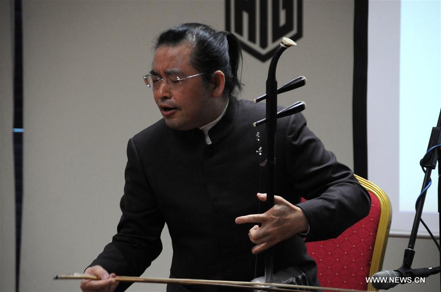 Chinese musician performs traditional "Erhu" in Amman - Xinhua ...