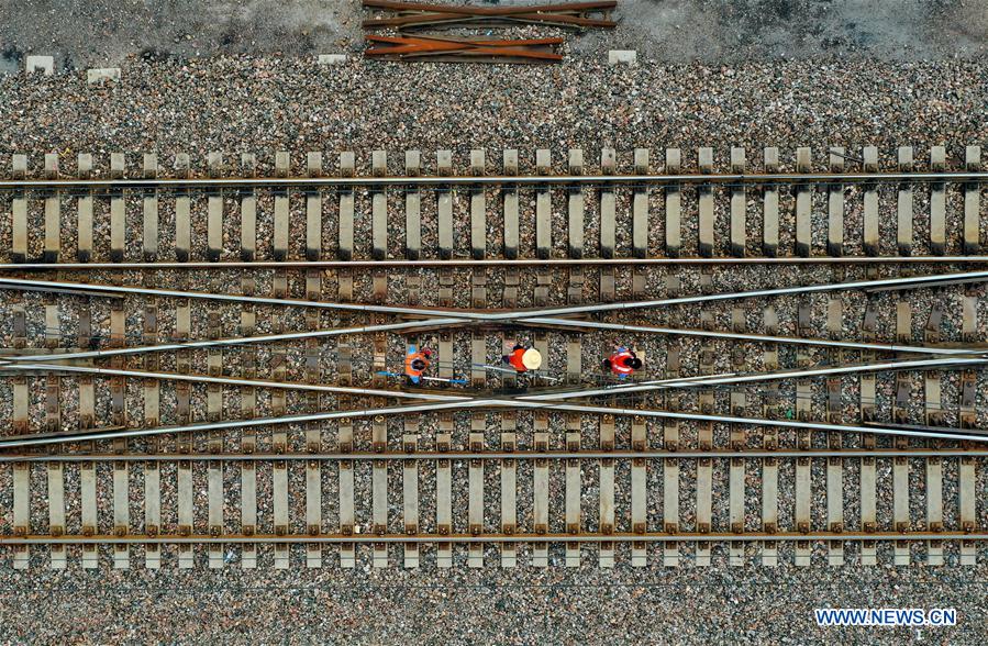 Patrol inspectors work along Daqin Railway to ensure transportation ...