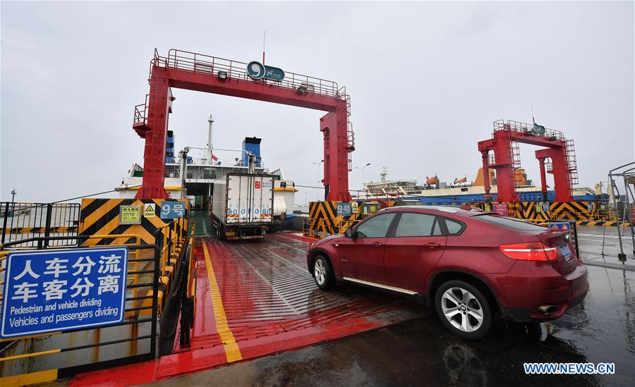 Ferry services across the Qiongzhou Strait partially resumed - Xinhua ...