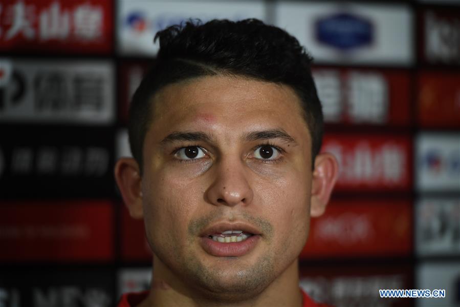 Ai Kesen of China attends press conference after match between China ...