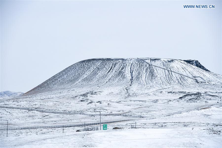 In pics: volcano covered by snow in north China's Inner Mongolia ...