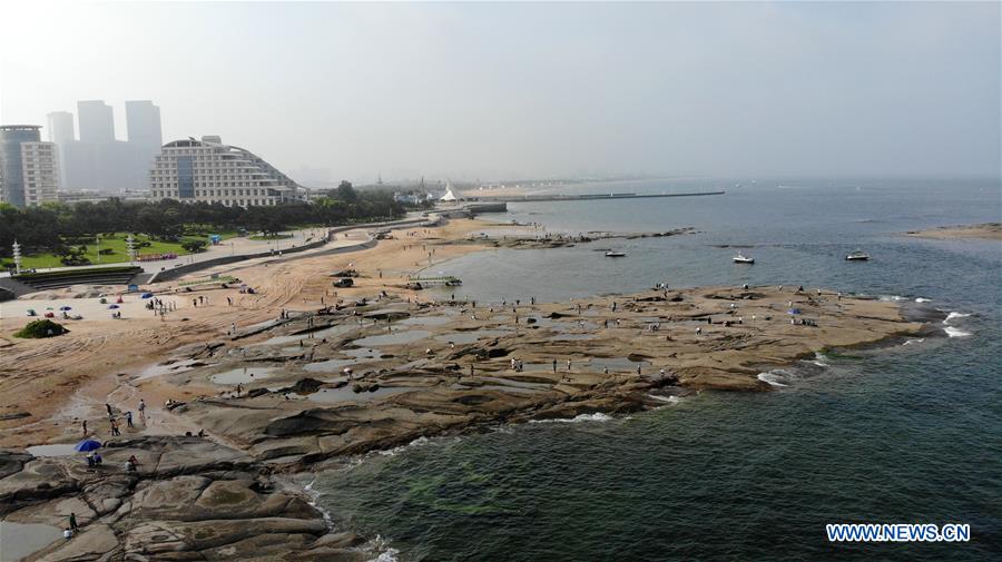 People enjoy their time in Rizhao, Shandong - Xinhua | English.news.cn