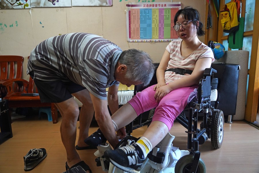 Paralysis Patient In Wheelchair
