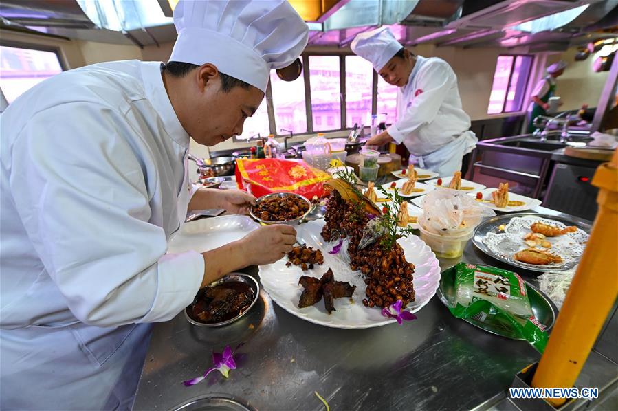 Chefs make dishes during cooking contest in Kuala Lumpur, Malaysia ...
